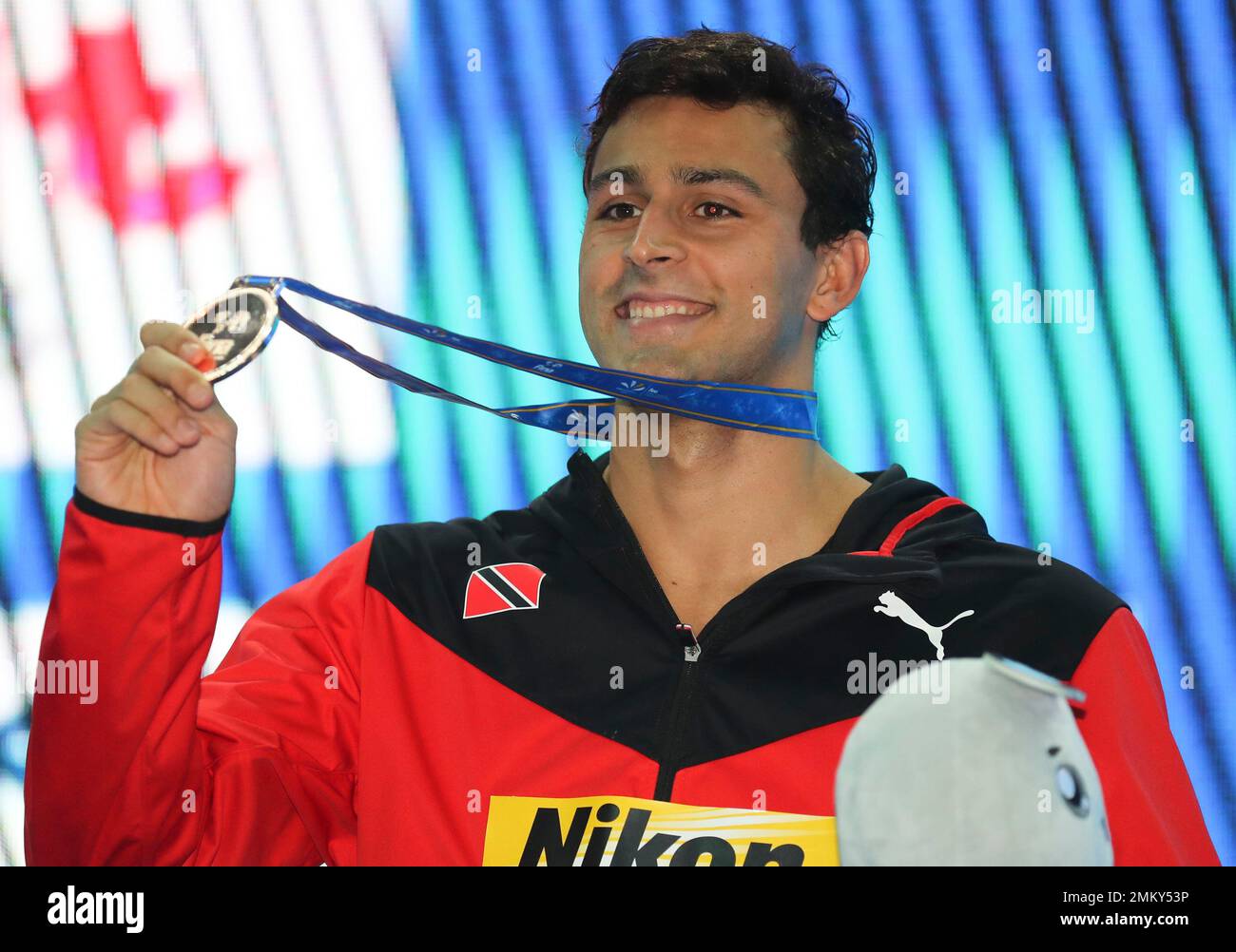 Bronze medalist Trinidad and Tobago's Dylan Carter pose during ...
