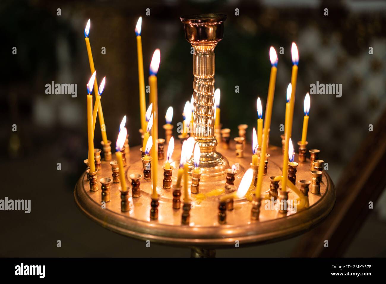 Praying memory candles in temple hi-res stock photography and images ...
