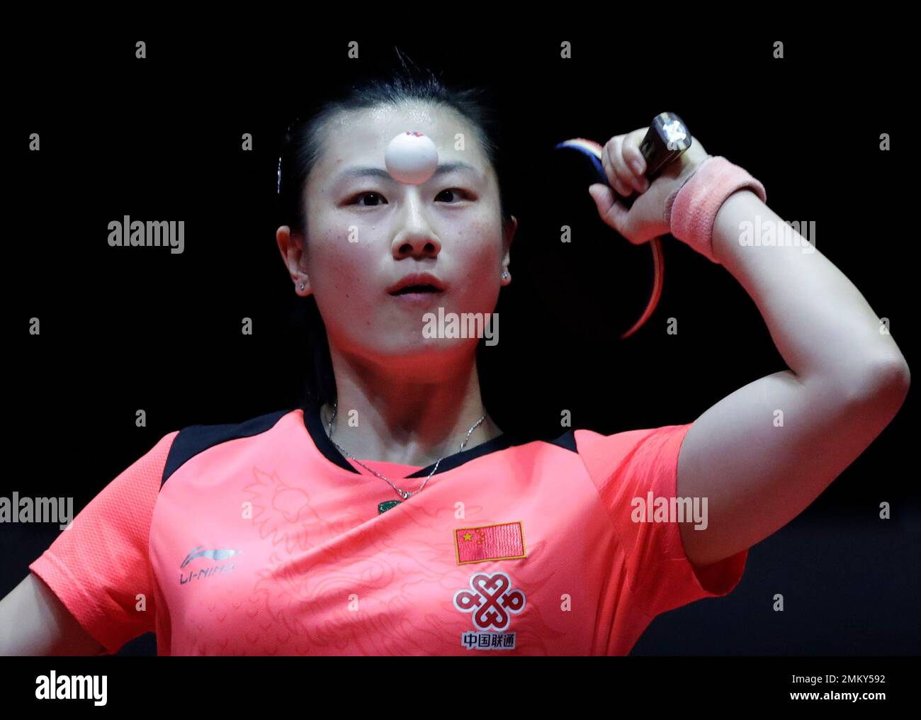 China's Ding Ning competes against China's He Zhuojia in the women's ...