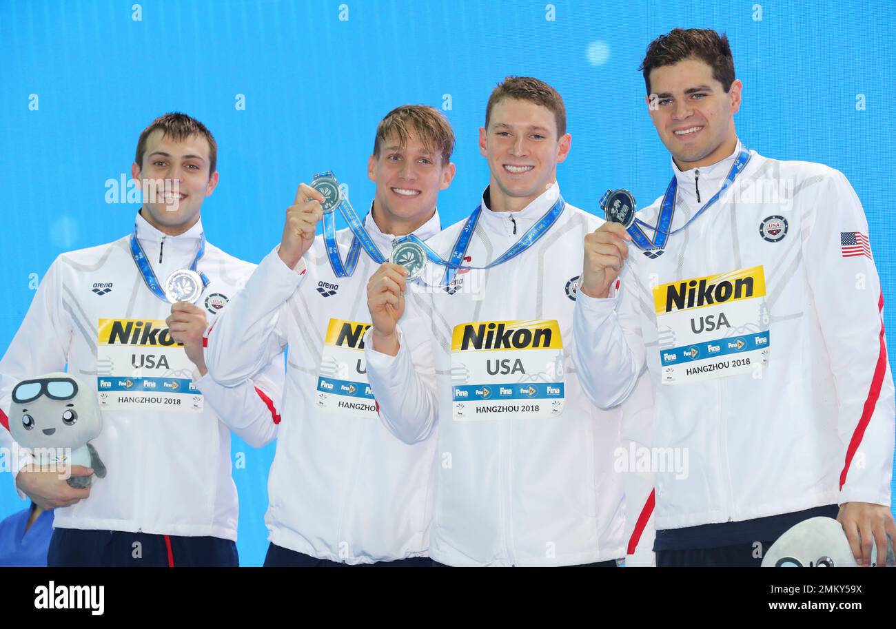 Silver medalist USA's ,from left, Ryan Held, Caeleb Dressel, Ryan ...