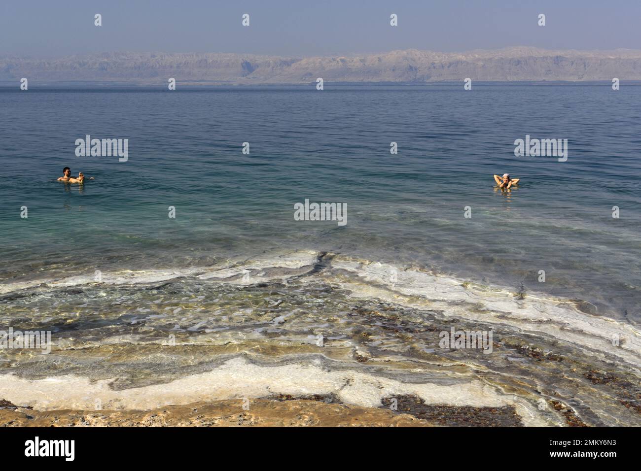 People swimming in the Dead Sea, the OH Beach hotel and resort, Jordan ...
