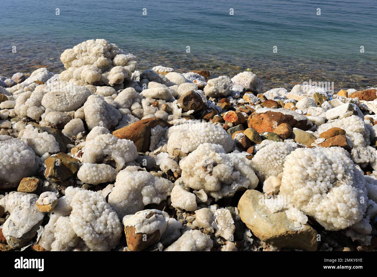 The salty shoreline of the Dead Sea, the OH Beach hotel and resort ...