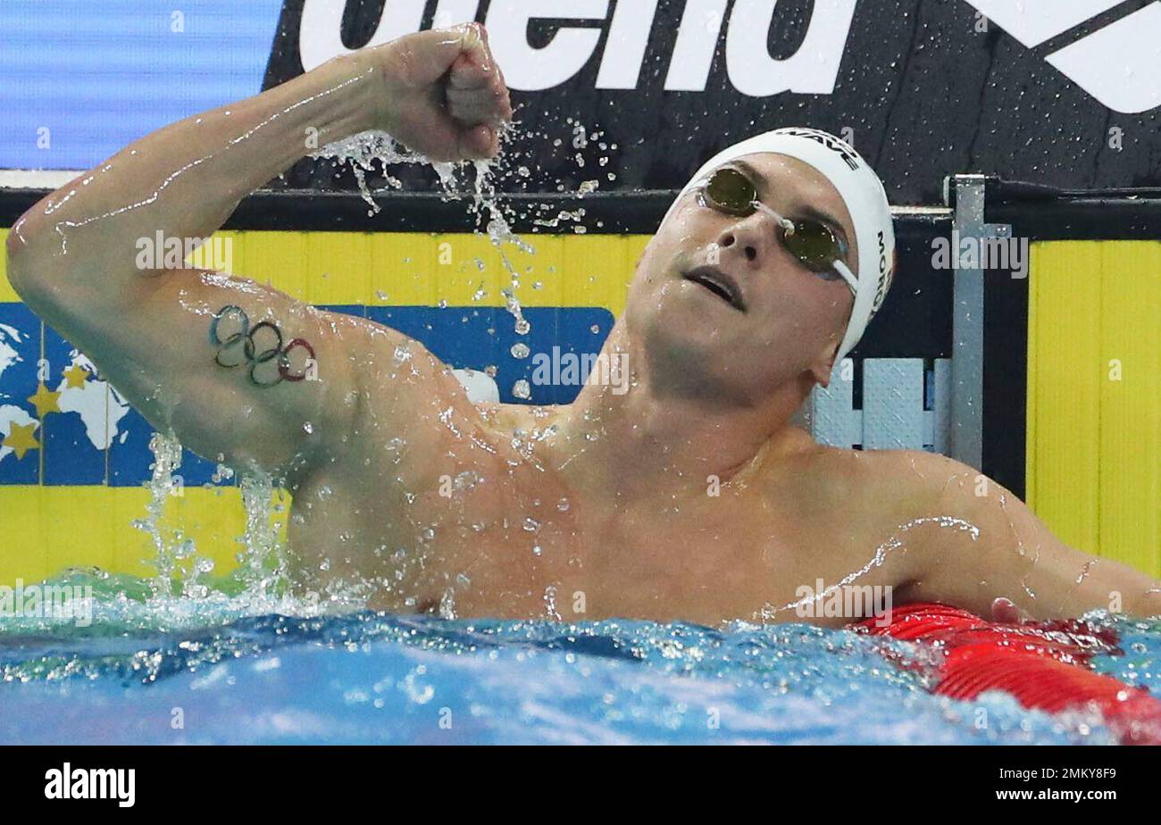 Russia's Vladimir Morozov reacts after winning gold at the men's 50m ...