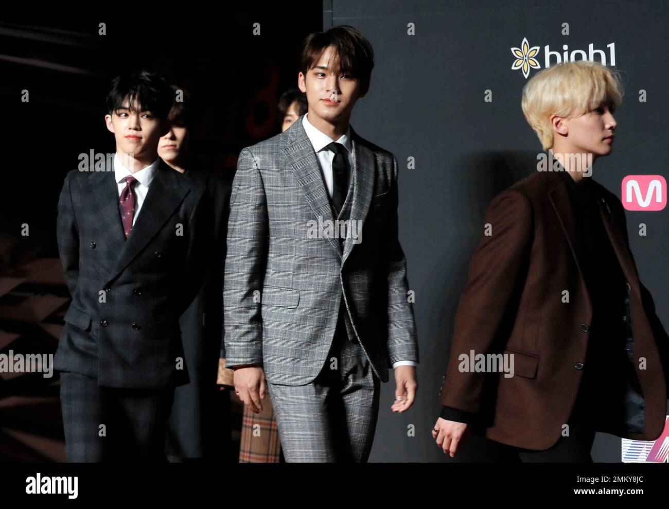 Members of South Korean music band Seventeen pose for photos on the red ...