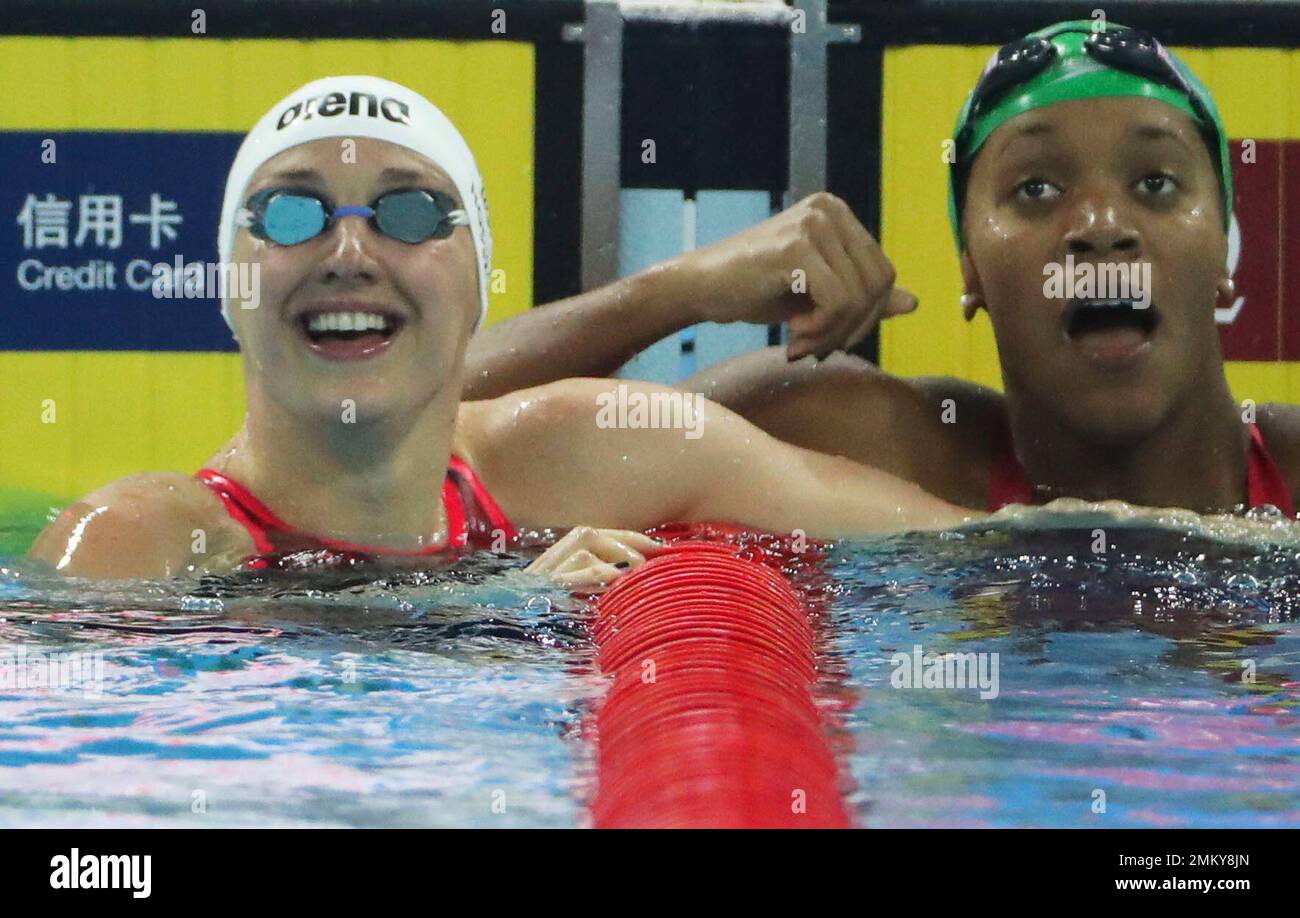 Hungary's Hosszu Katinka, left, reacts beside Jamaica's Alia Atkinson ...