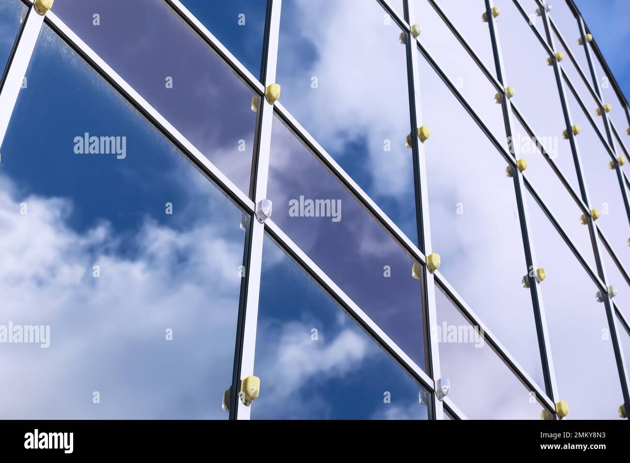 Architectural detail of the facade with multiple reflections of other ...