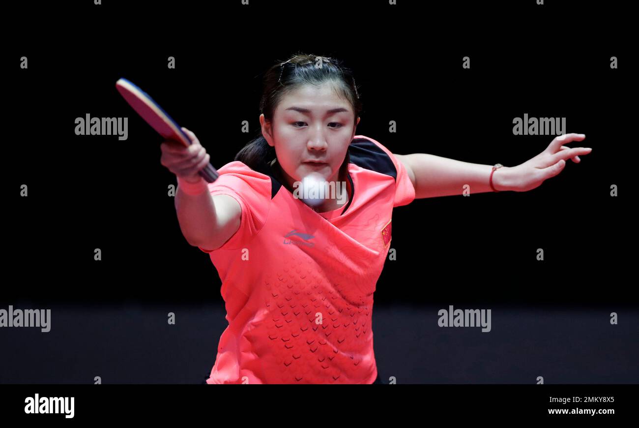 China's Chen Meng competes against China's Wang Manyu in the women's ...