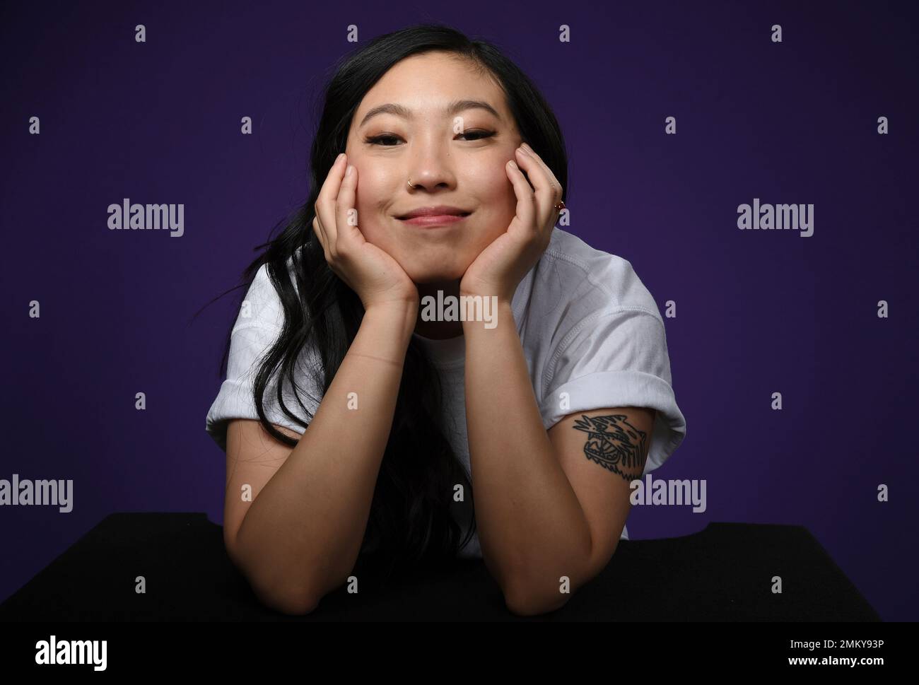 In this Dec. 5, 2018 photo, actress-rapper Awkwafina poses for a ...
