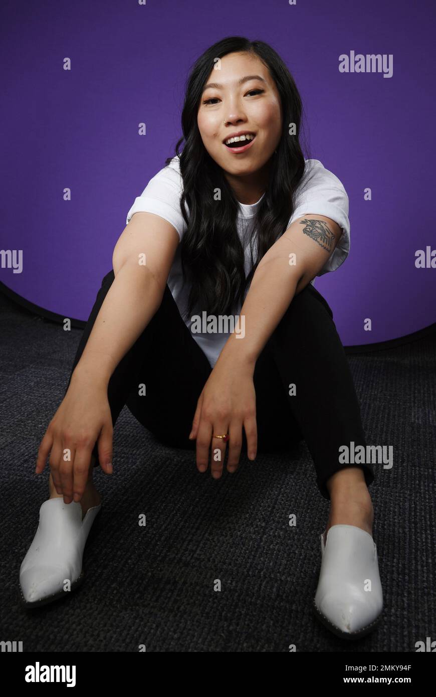 In this Dec. 5, 2018 photo, actress-rapper Awkwafina poses for a ...