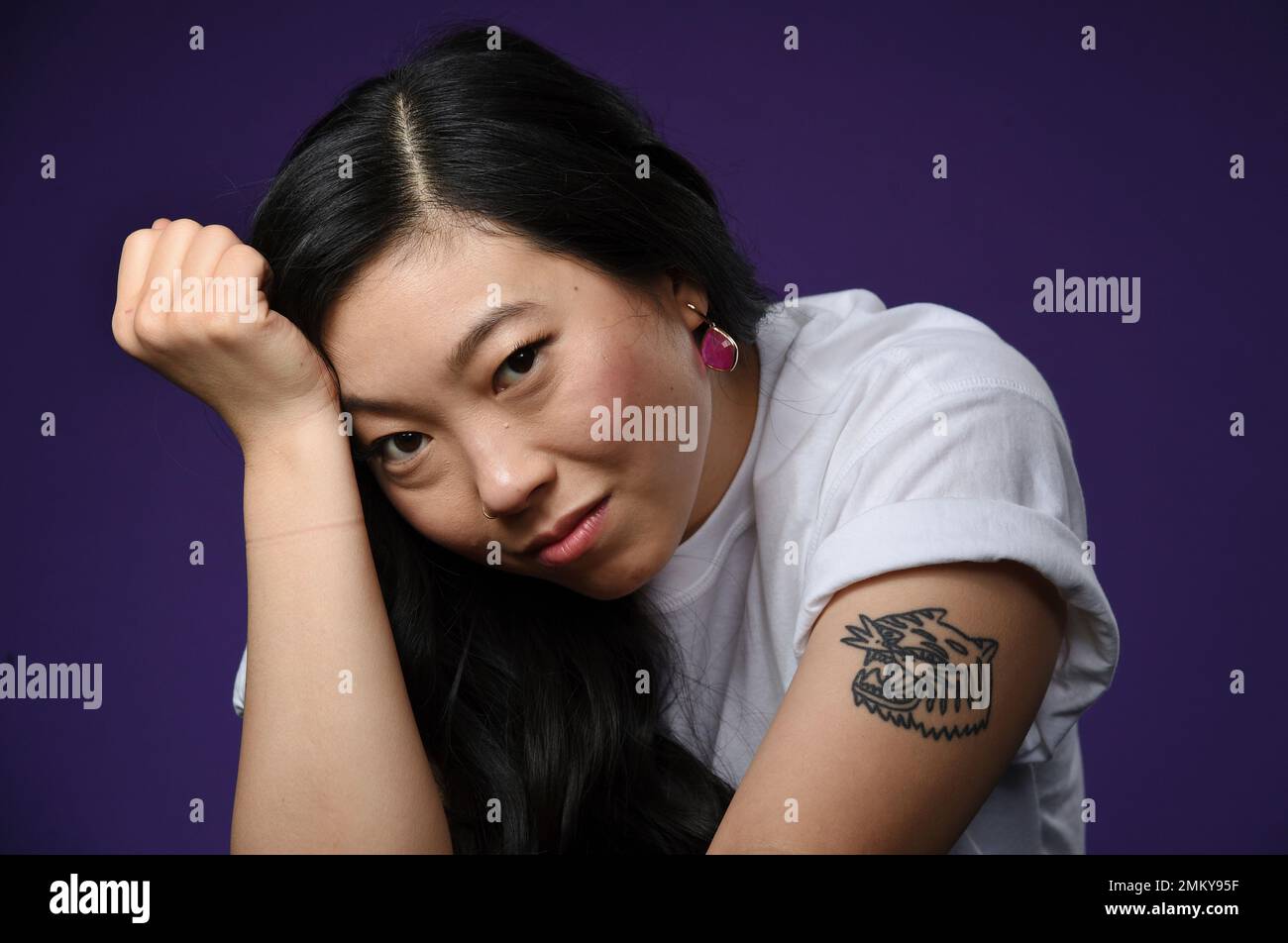 In this Dec. 5, 2018 photo, actress-rapper Awkwafina poses for a ...