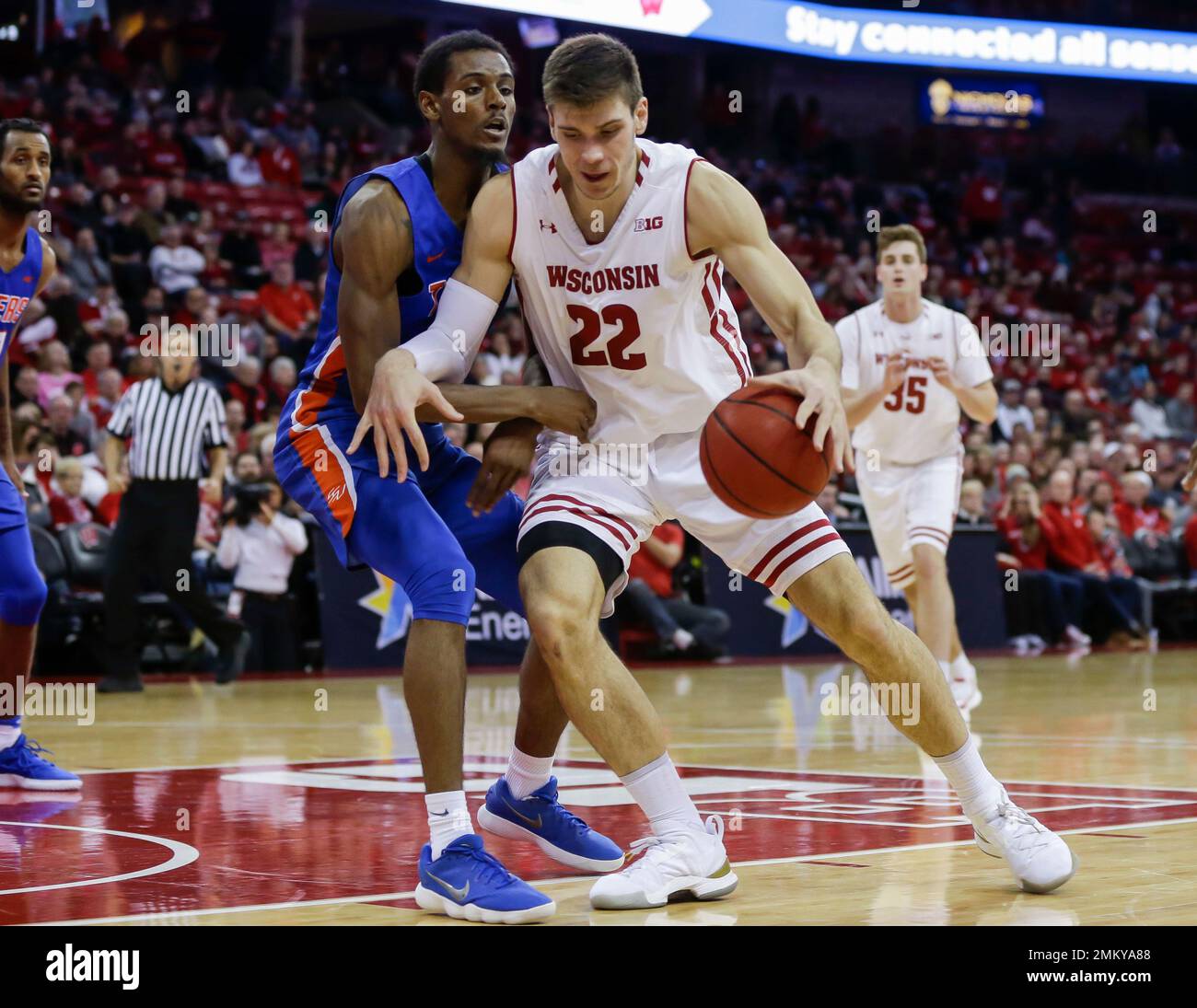 Wisconsin's Ethan Happ (22) drives on Savannah State's Adam Saeed (10 ...