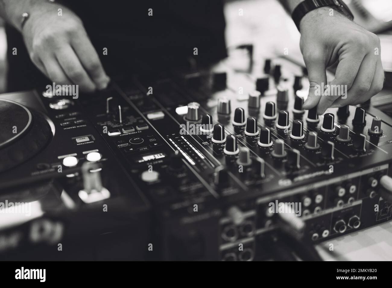 Dj plays on console disco hi-res stock photography and images - Alamy