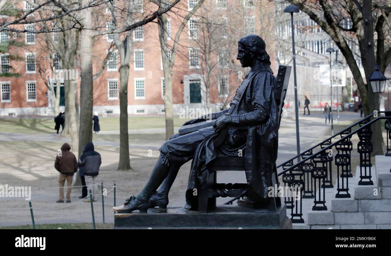 The John Harvard statue in Harvard Yard at Harvard University in ...