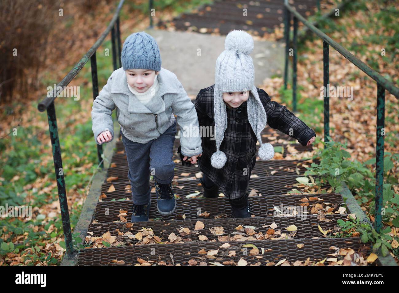 Children walk in the autumn park in the fall Stock Photo - Alamy