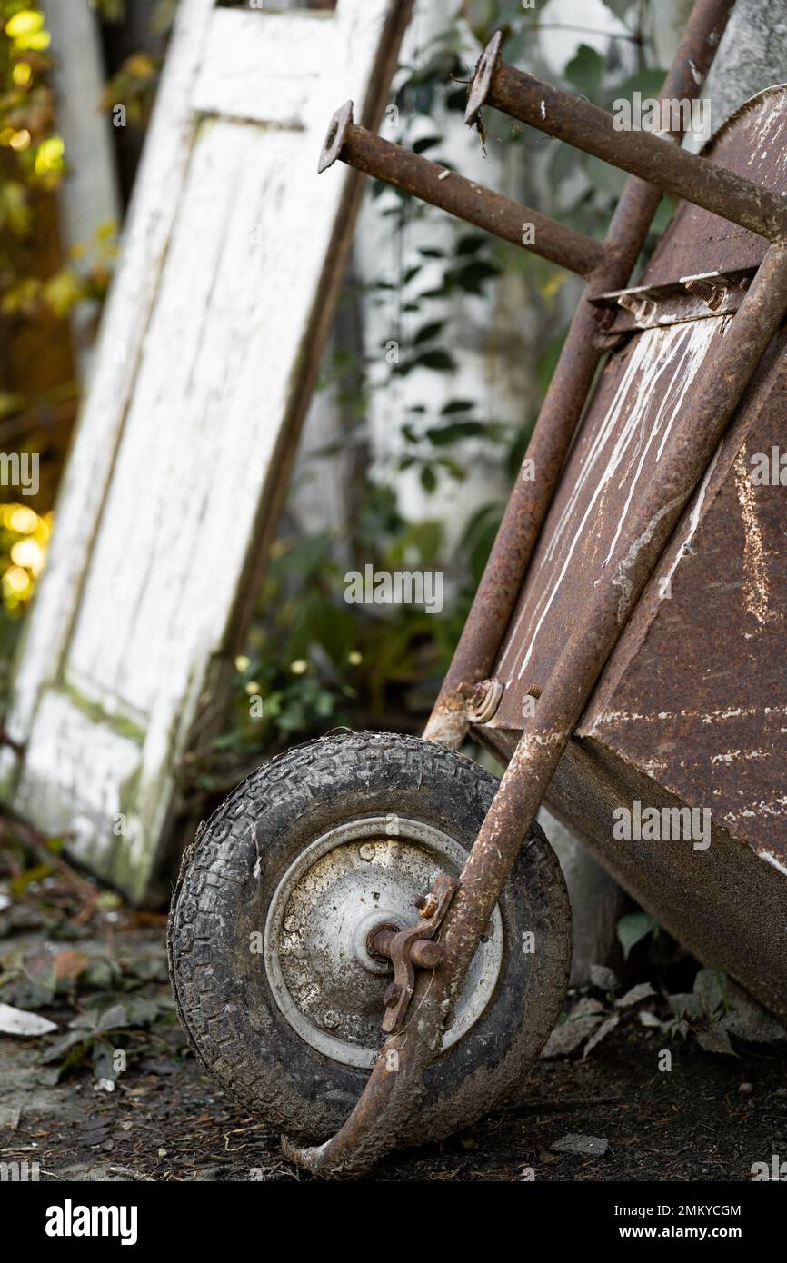 Wheelbarrow with one wheel hi-res stock photography and images - Alamy