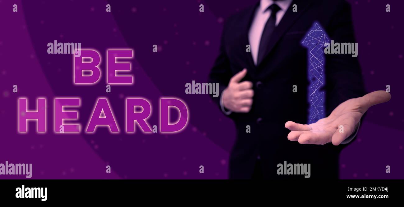Sign displaying Be Heard. Word Written on promote a state of complete ...