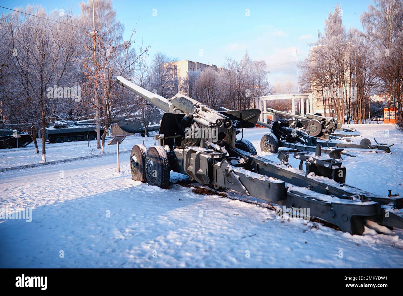 Military tank in a row. Battle tank in the snow on the roadside of ...