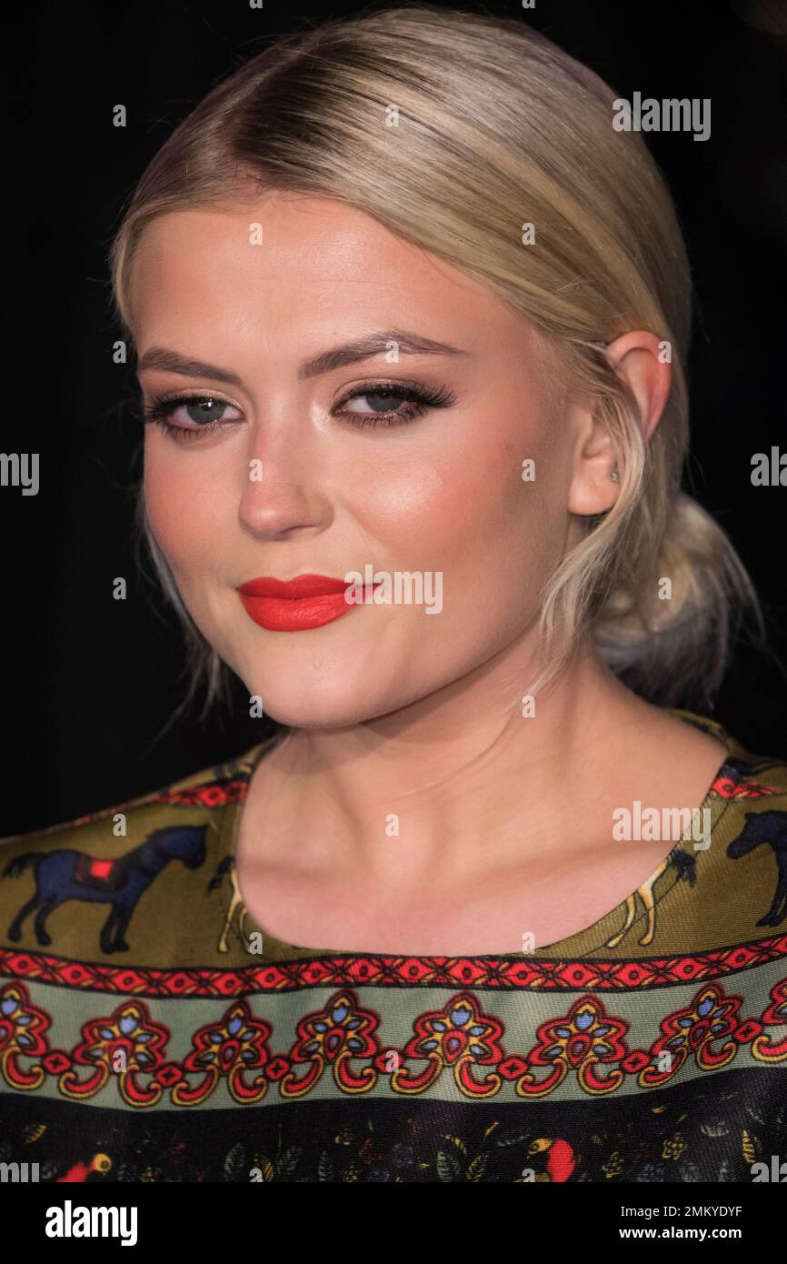 Lucy Fallon poses for photographers upon arrival at the 'Mary Poppins ...