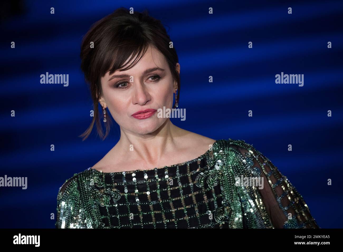 Actress Emily Mortimer poses for photographers upon arrival at the ...