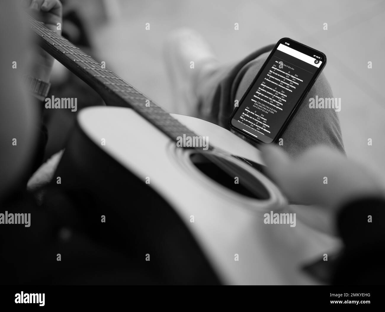 Guy playing classical guitar Black and White Stock Photos & Images - Alamy