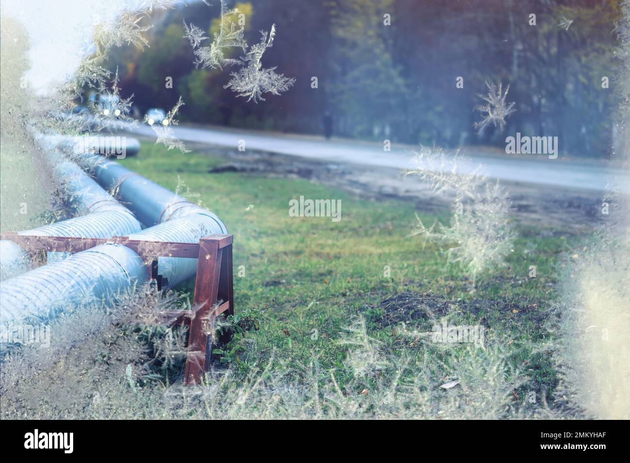 Metal pipes on the street. pipes from the pipeline. gas pipeline for ...