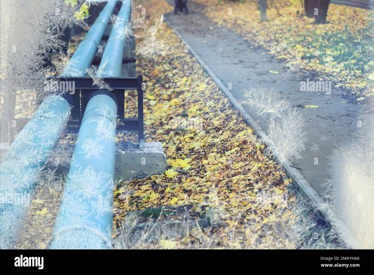 Metal pipes on the street. pipes from the pipeline. gas pipeline for ...