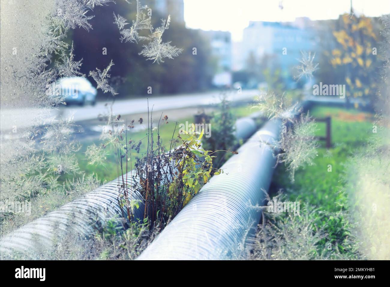 Metal pipes on the street. pipes from the pipeline. gas pipeline for ...