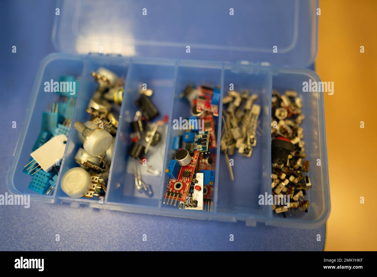 engineers assemble electrical circuits from radio components in a ...