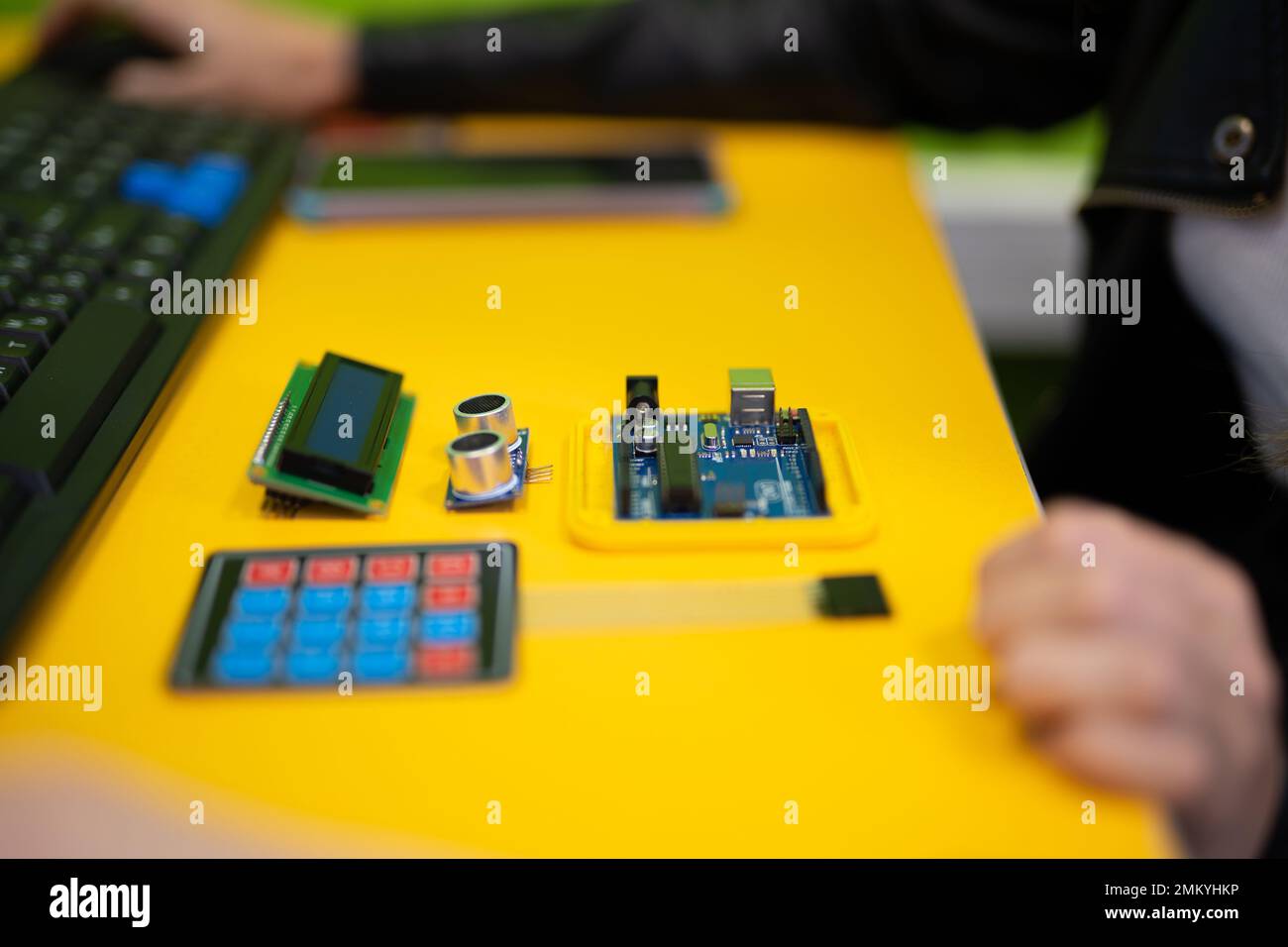 engineers assemble electrical circuits from radio components in a ...