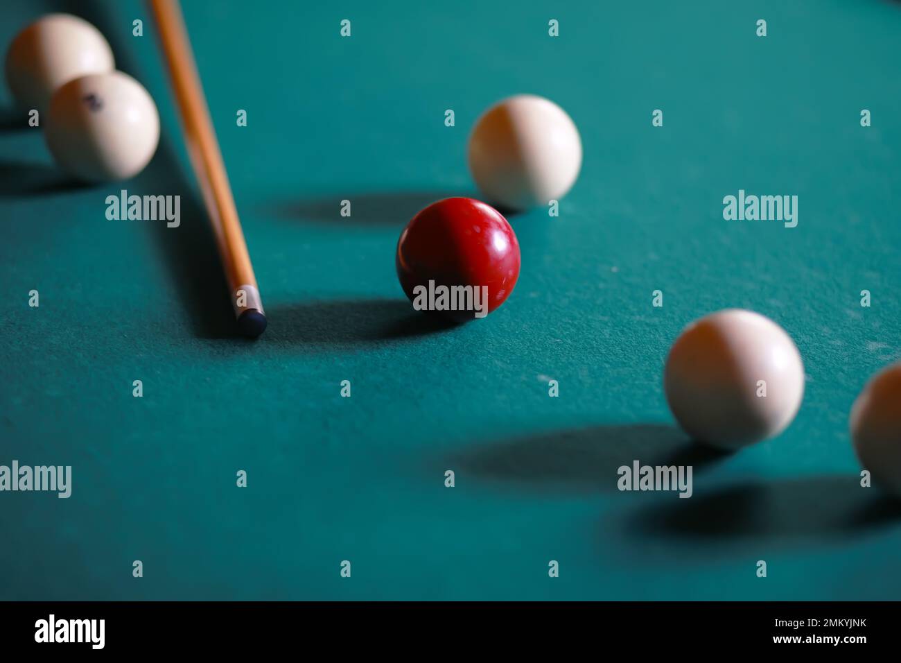 Russian billiard balls, cue, triangle, chalk on a table Green cloth Top ...