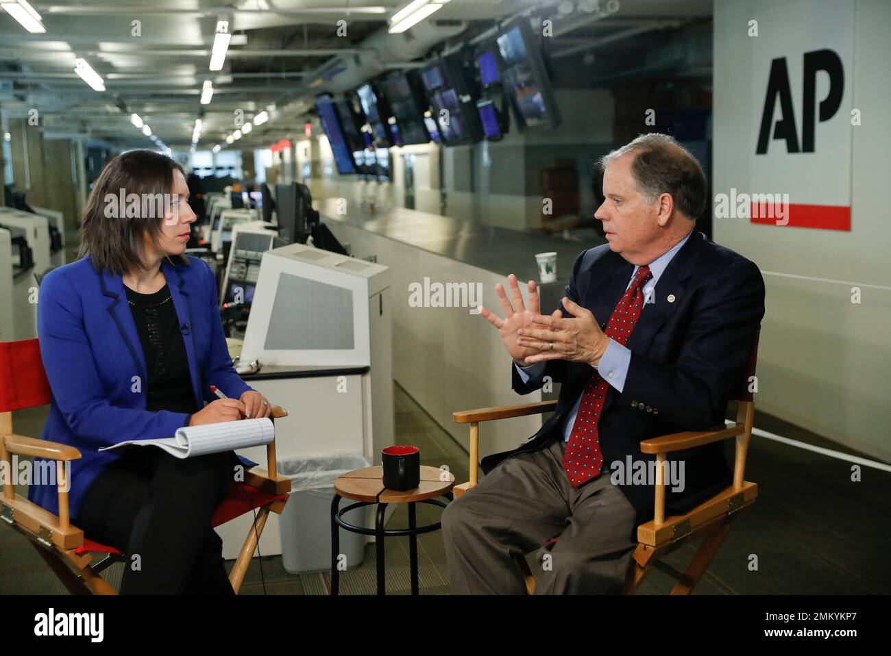 Associated Press Washington Bureau Chief Julie Pace, left, listens to ...
