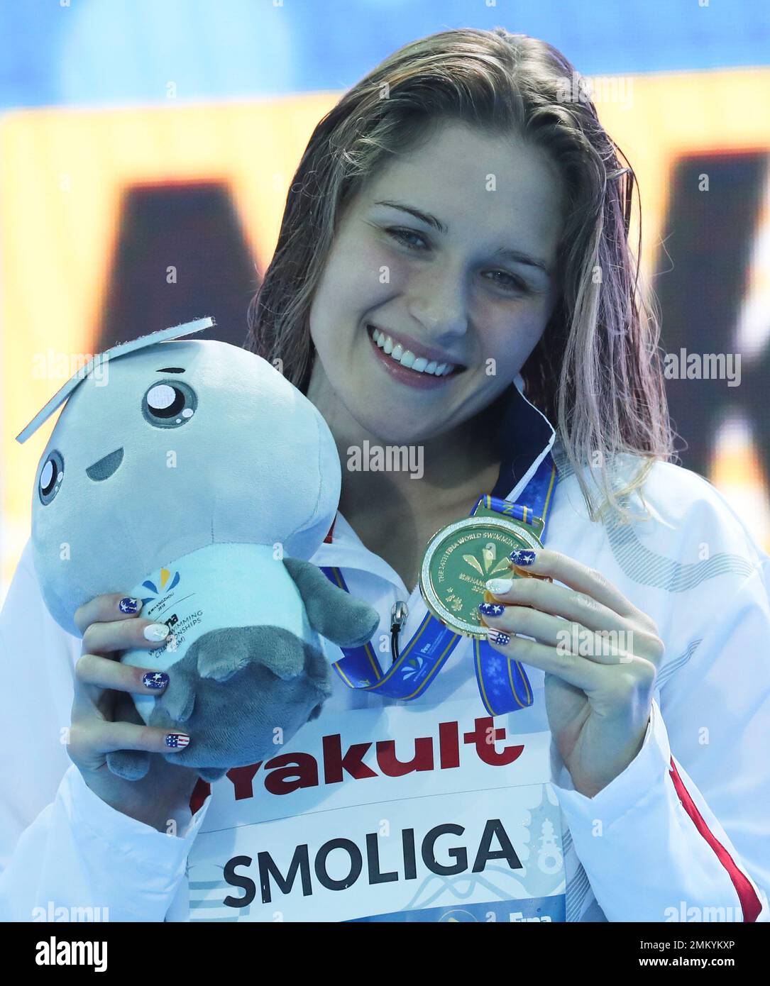 Gold medalist USA's Olivia Smoliga pose during ceremonies for the women ...