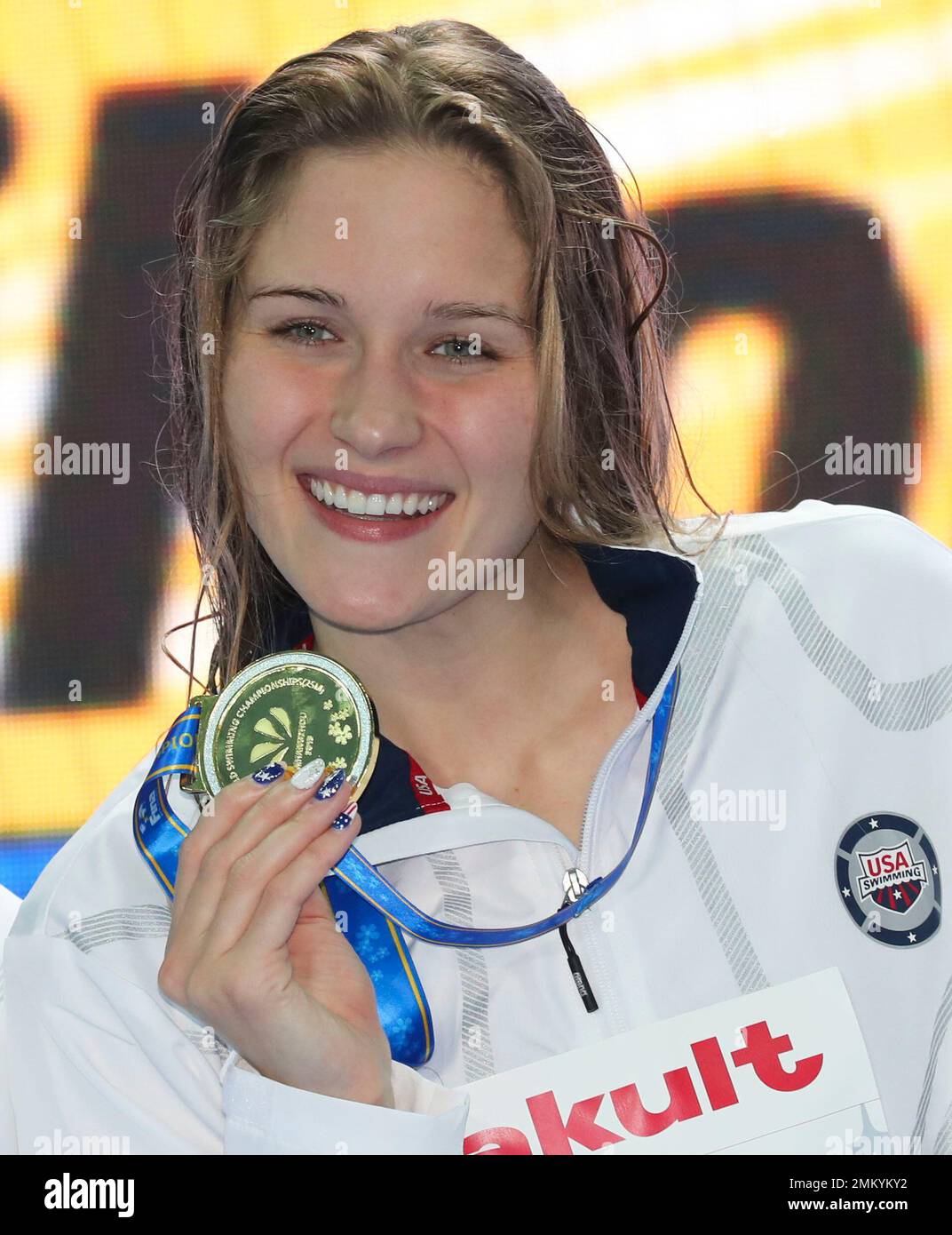 Gold medalist USA's Olivia Smoliga smiles during ceremonies for the ...