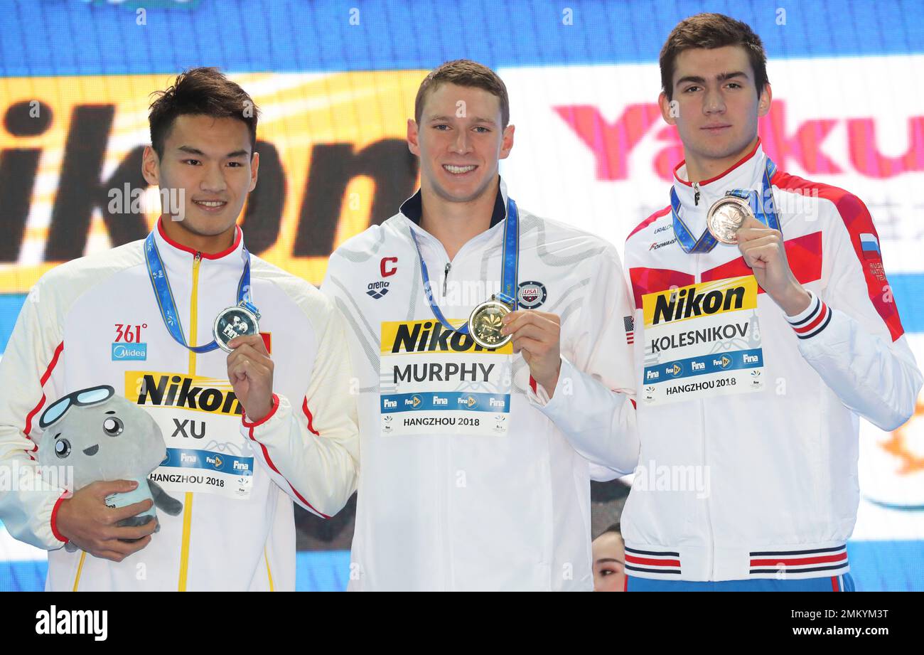 From left, silver medalist China's Jiayu Xu, gold medalist USA's Ryan ...