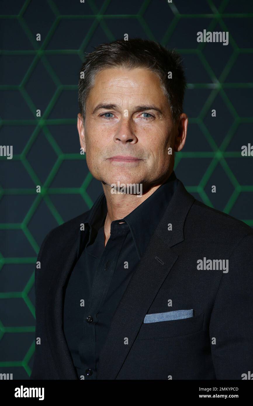 Rob Lowe poses for photographers upon arrival at the Bloomberg and ...