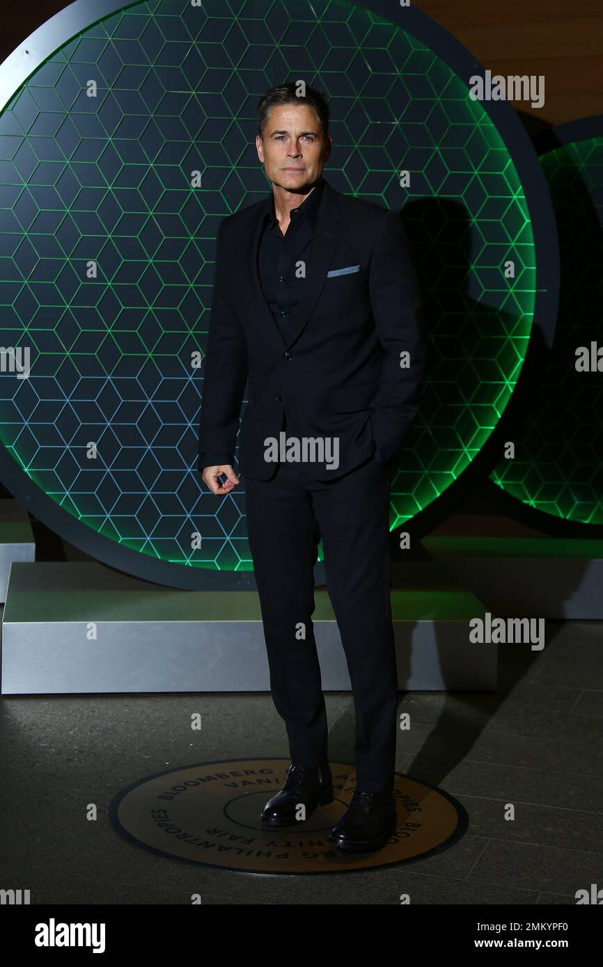 Rob Lowe poses for photographers upon arrival at the Bloomberg and ...