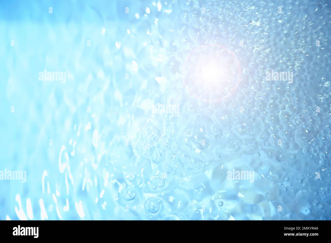 Blue water texture. Bubbles bubbling water Stock Photo - Alamy