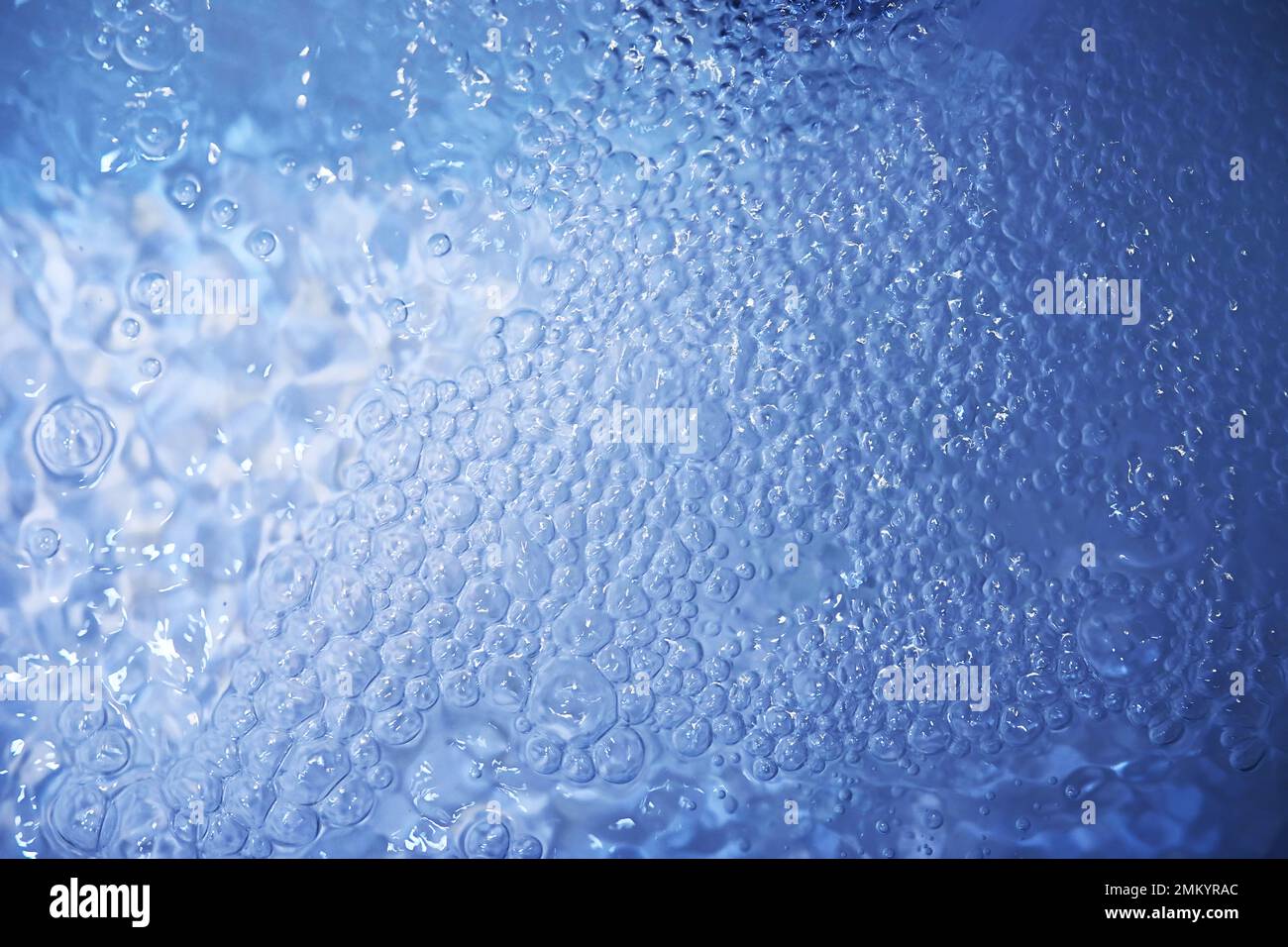 Blue water texture. Bubbles bubbling water Stock Photo - Alamy