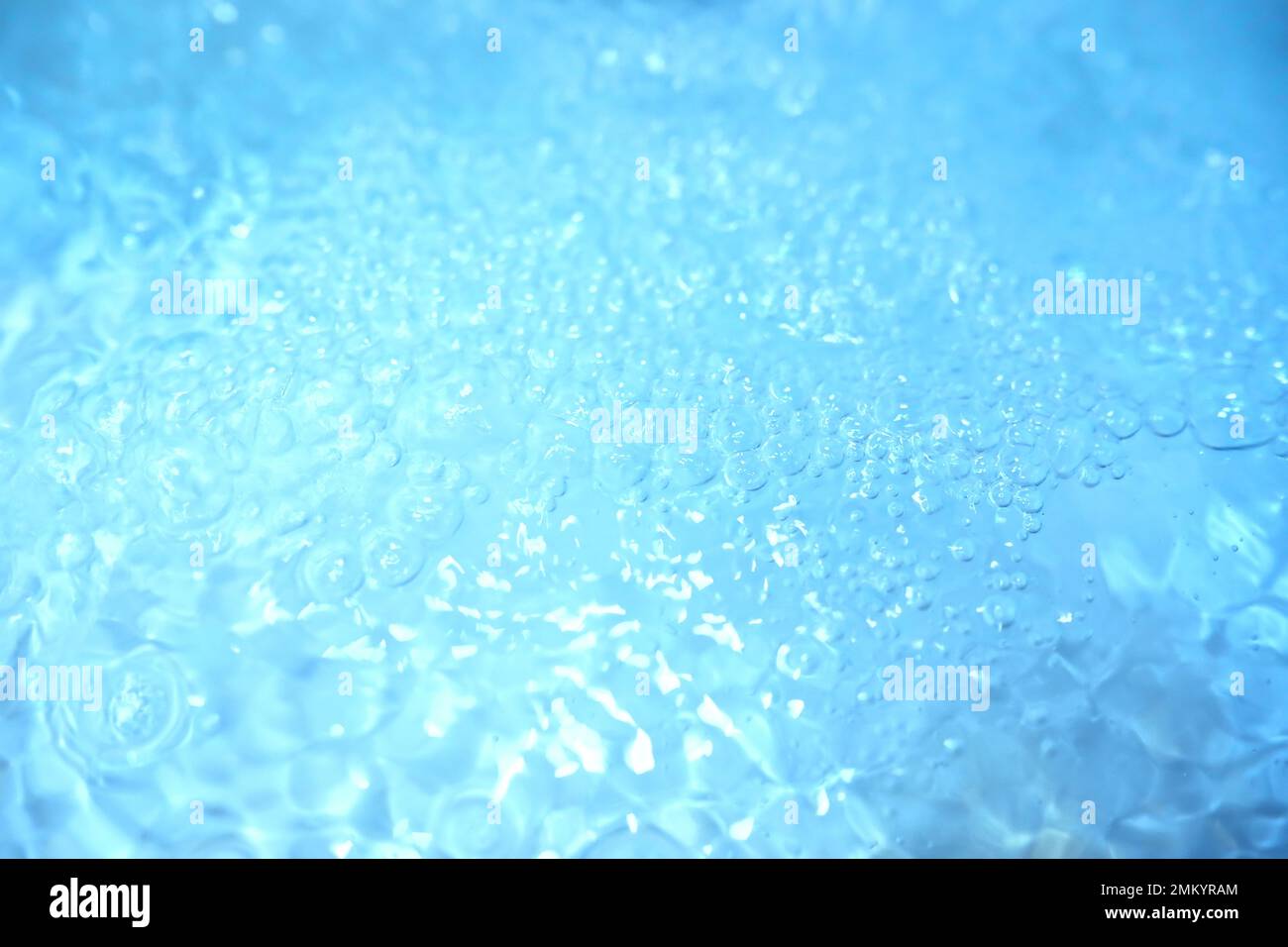 Blue water texture. Bubbles bubbling water Stock Photo - Alamy