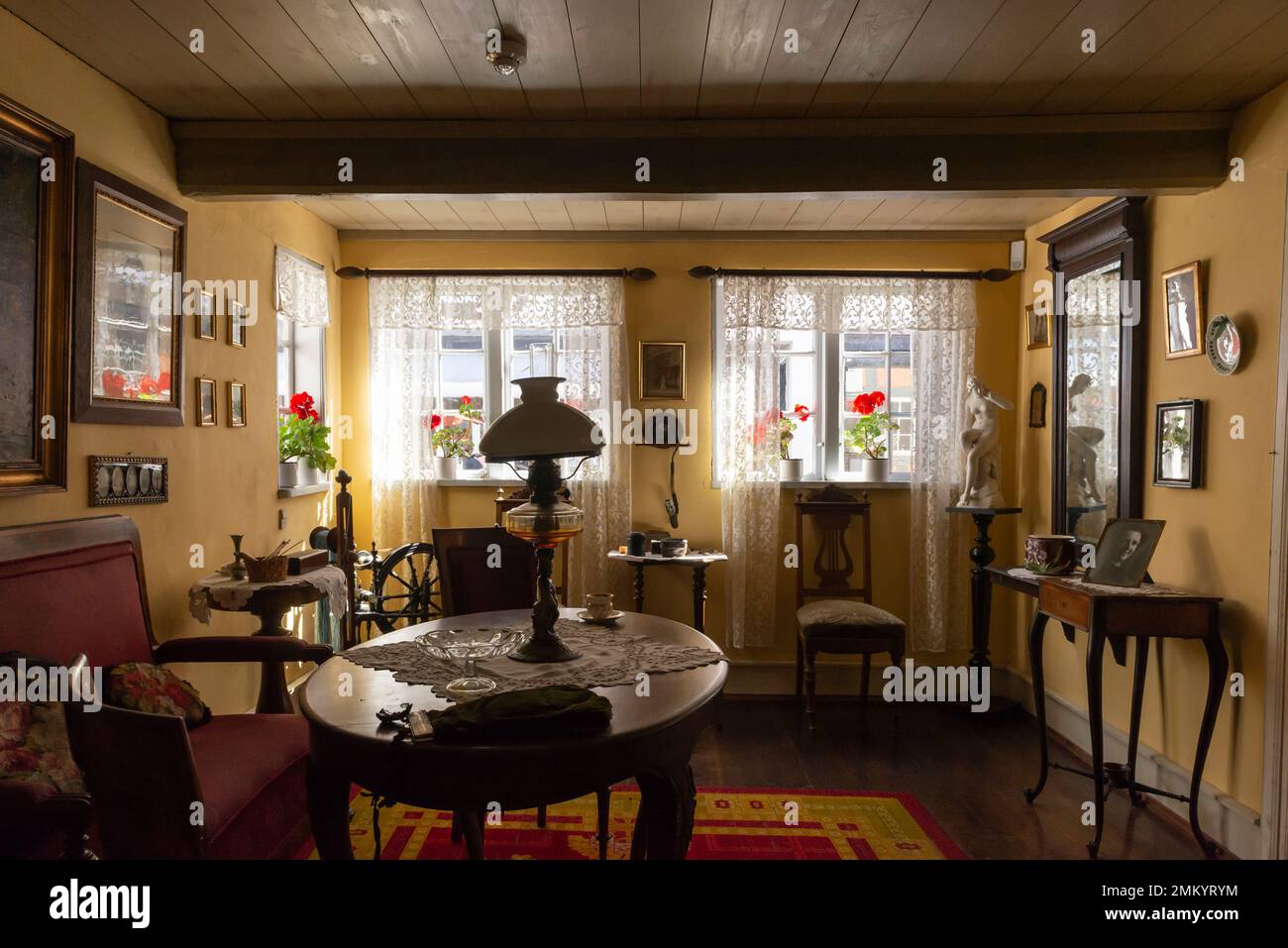 Living room with historical furniture in the old dye works of the East ...