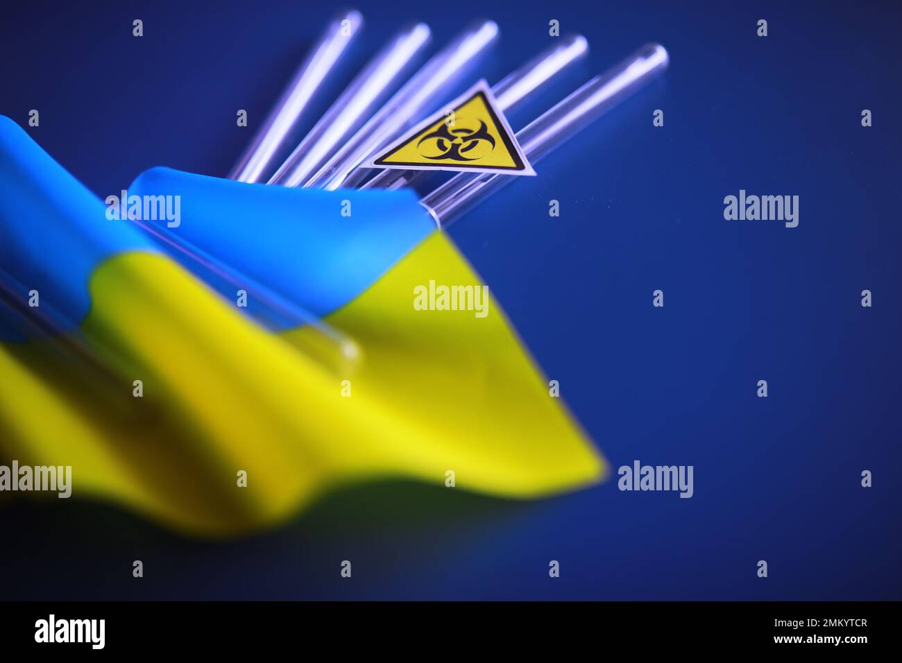 Ukrainian flag biohazard and test tubes. Assistance to Ukraine in ...