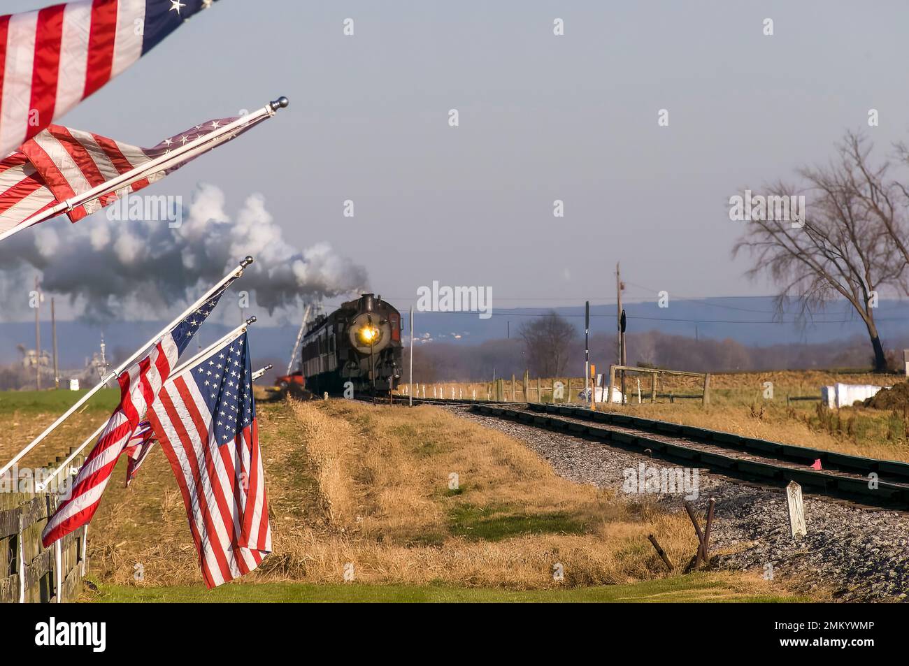 A View of a Classic Steam Passenger Train Approaching, With American ...