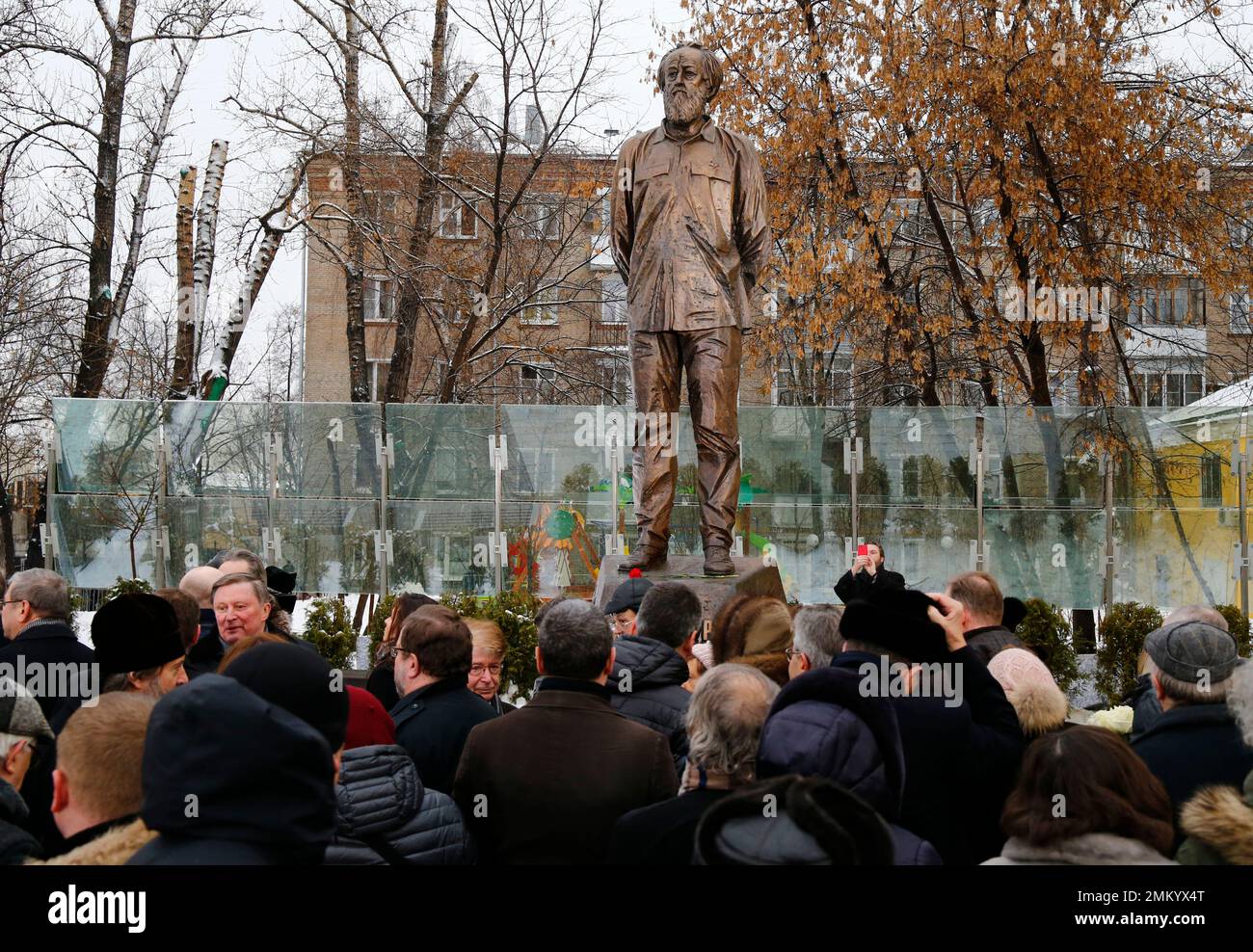 The crowd surround the monument to the Nobel Prize-winning author ...