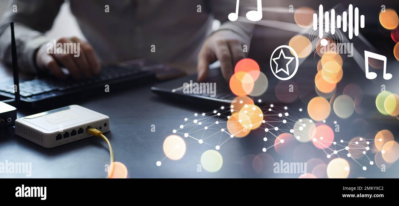 Modern dual band wireless router. Man working in the background. Fast ...