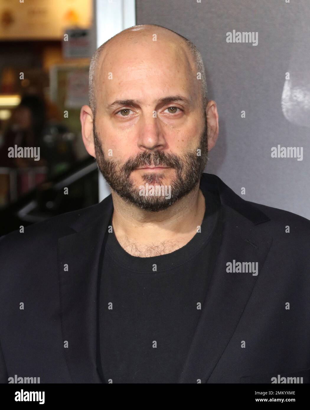 Aaron L. Gilbert arrives at the world premiere of "The Mule" on Monday ...