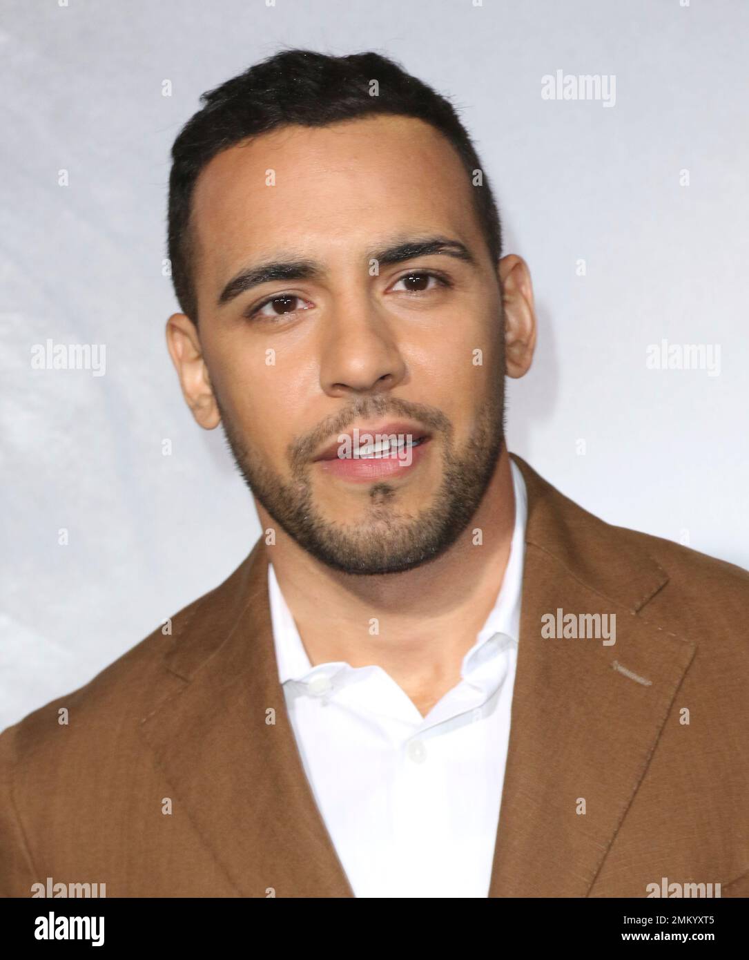 Victor Rasuk arrives at the world premiere of "The Mule" on Monday, Dec ...