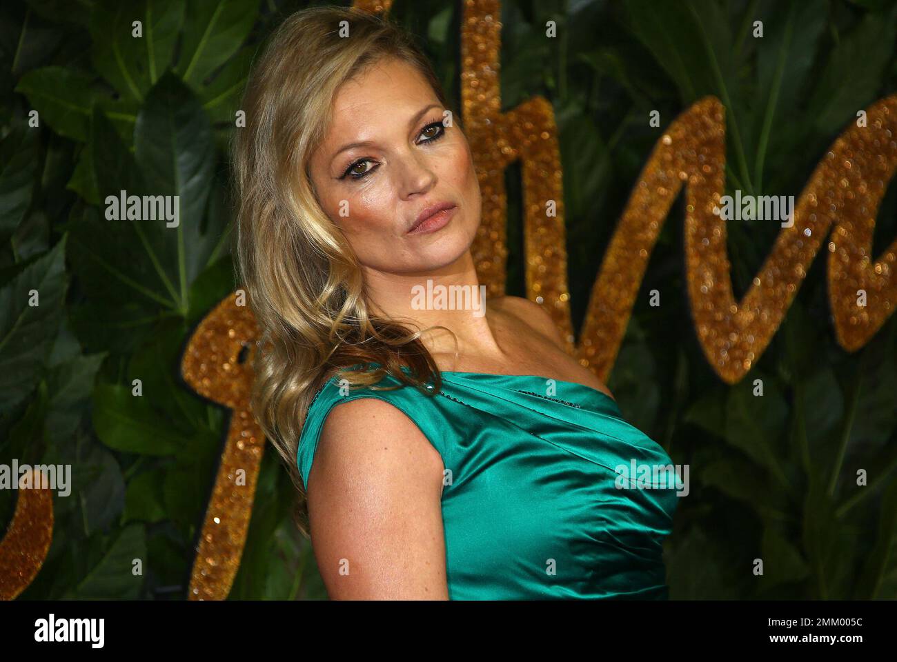 Kate Moss poses for photographers upon arrival at the The Fashion ...