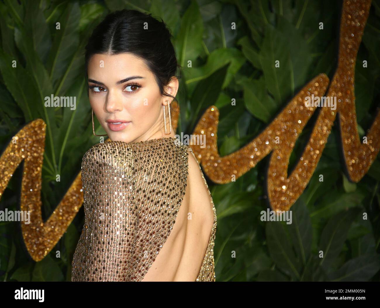 Kendall Jenner poses for photographers upon arrival at the The Fashion ...
