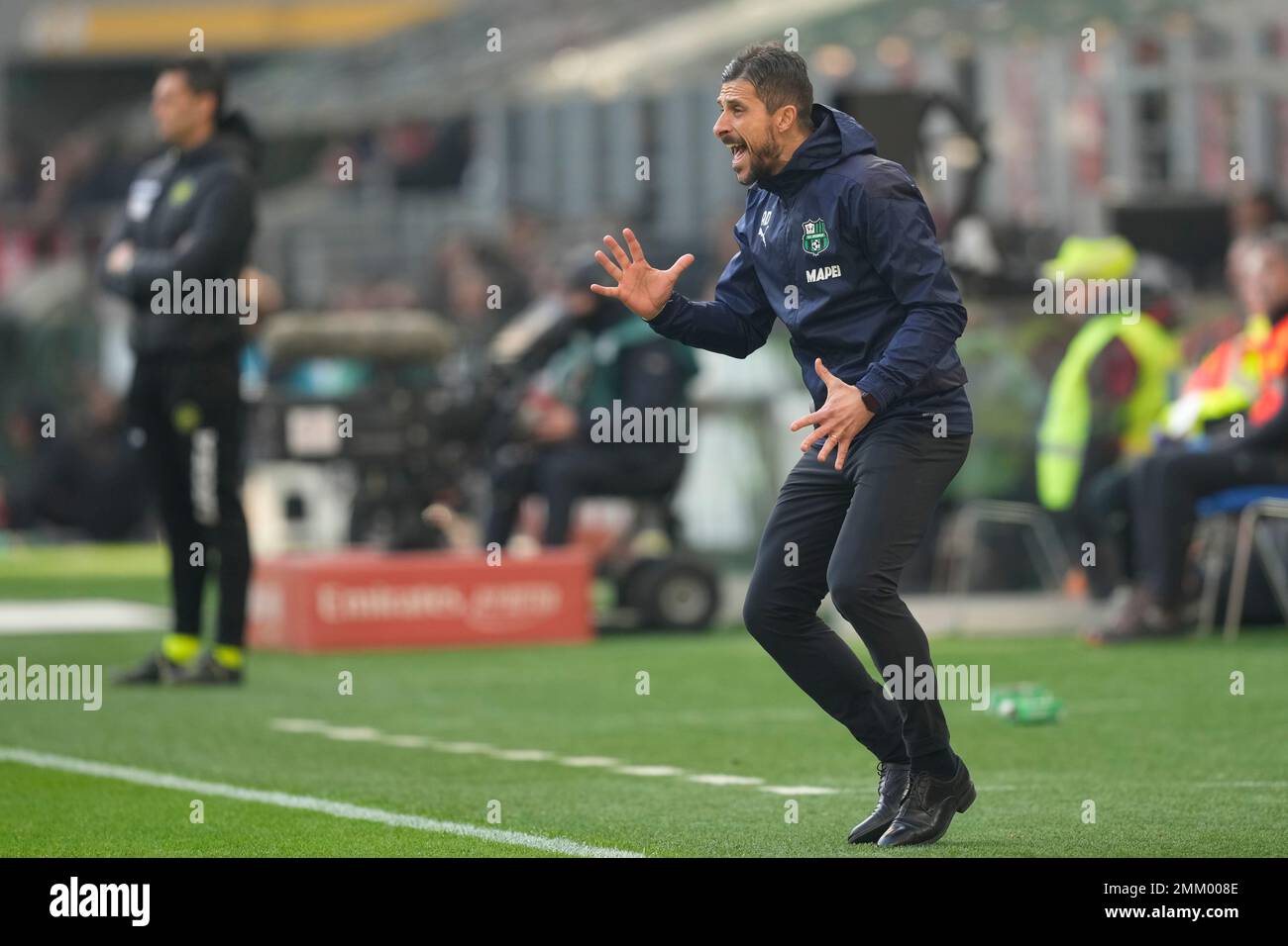Sassuolo's head coach Alessio Dionisi gives directions to his players ...