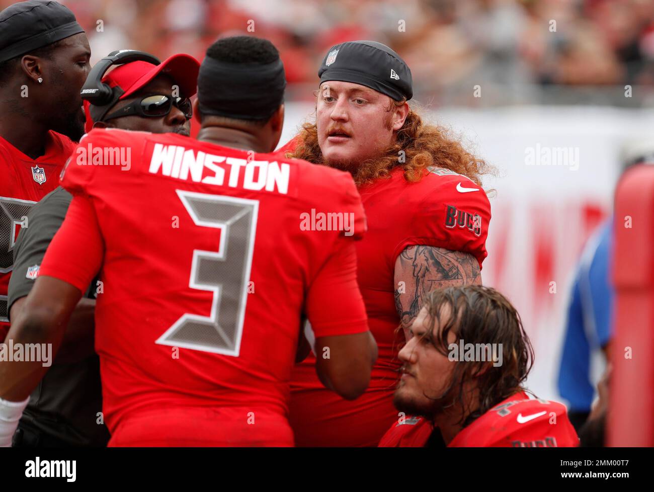 Tampa Bay Buccaneers center Ryan Jensen (66) and quarterback Jameis ...